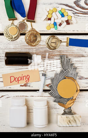 Medals, syringe, and card Stock Photo - Alamy