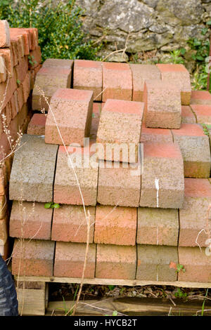 Stack of reclaimed bricks ready to be sold as second hand Stock Photo ...