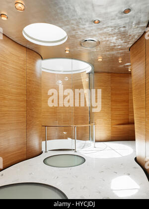 Curved bamboo walls and skylights in the elevator lobby. One Jackson ...