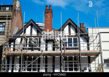 Scaffold Scaffolding Painting and decorating on small modern house ...