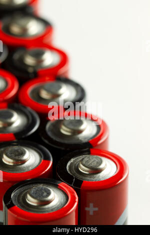 Background of red AA batteries Stock Photo - Alamy