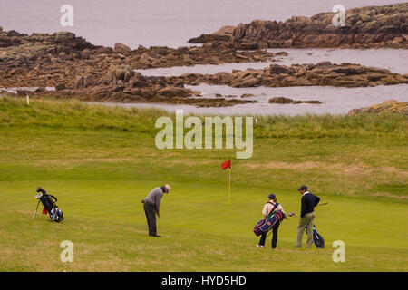 CRUIT ISLAND, DONEGAL, IRELAND - Golfers at Cruit Island Golf Club, on ...