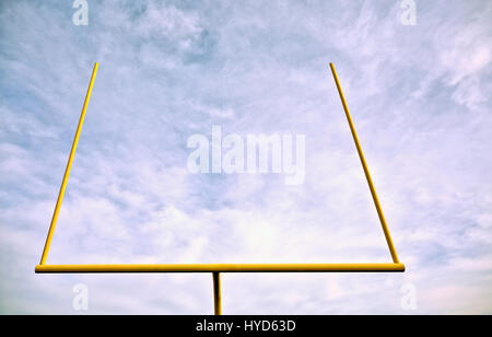 Low angle view of American football player looking away Stock Photo - Alamy
