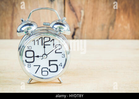 Wall clock show nine o'clock on marble texture. Office clock show 9pm ...