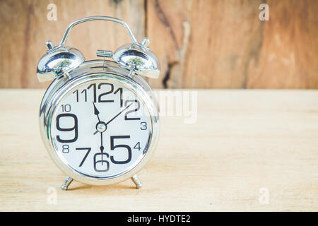 Clock show 11 am or pm on steel rusty background with copy space ...