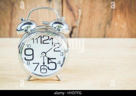 Wall clock show four o'clock on marble texture. Office clock show 4pm ...