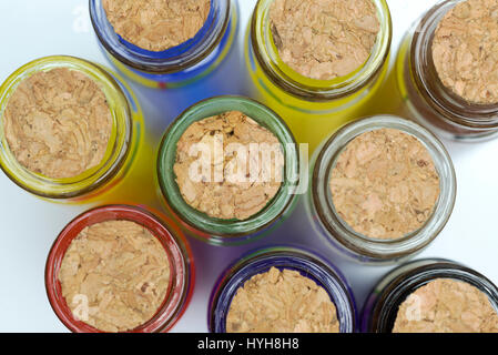 Closed flasks with liquid on a white background Stock Photo - Alamy