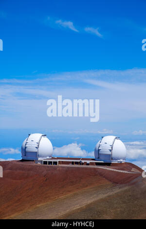 Observatories on Mauna Kea, Hawaii, at sunrise. Left to right they are ...