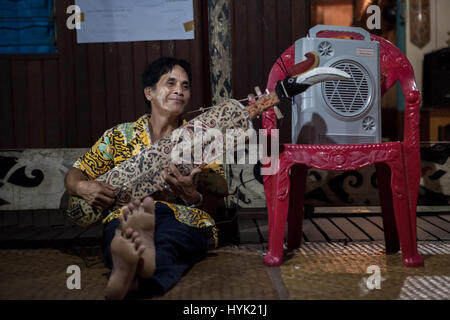Sapeh, or Sape, a traditional Dayak string instrument of Borneo origin ...