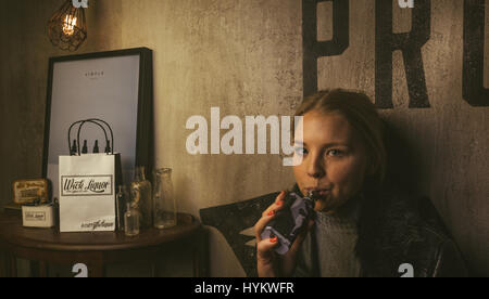 LONDON, UK: A female vaper relaxes. LIFTING the lid on UK underground ...