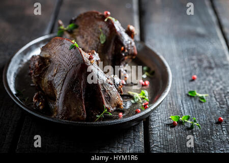 Homemade roasted doves with spices and pepper on white table Stock ...