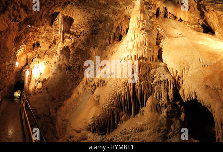 stalagmite with color light in the cave Stock Photo - Alamy