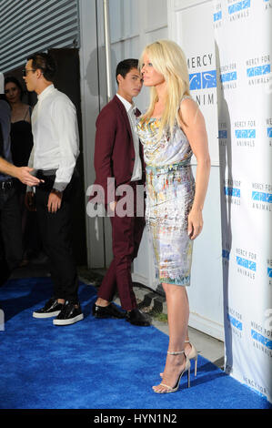 Brandon Lee and Pamela Anderson attend the amfAR Cannes Gala 2019 at ...