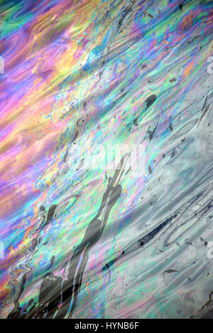 Oil patterns on water in a bog Stock Photo - Alamy