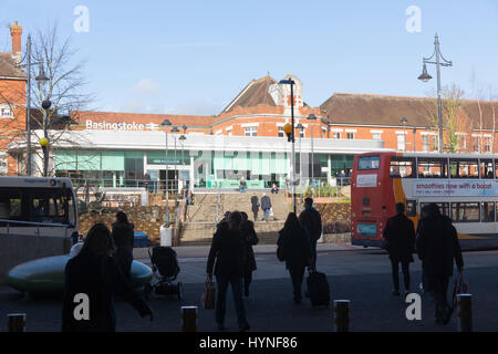 Shoppers heading towards Basingstoke train station, Hampshire Stock ...