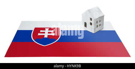 A small Slovakia flag on an abstract blurry background Stock Photo - Alamy