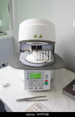 Oven for baking ceramics in the dental laboratory Stock Photo - Alamy