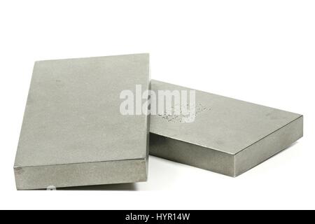titanium ingots isolated on white background Stock Photo - Alamy