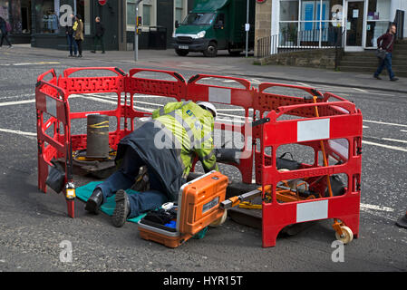 BT engineer working on cables in roadside cabinet Stock Photo: 18486632 ...