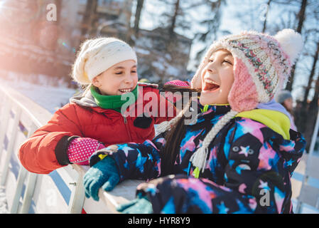 Happy latin girls having fun together outdoor around city - Main focus ...