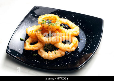 Fried calamari and sepia in a batter of tempera flour and glass of wine ...