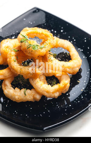 Fried calamari and sepia in a batter of tempera flour and glass of wine ...