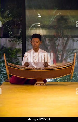 Musician playing a local instrument, a xylophone or pattala, in the ...