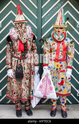 Ausseer Flinserl disguised people in costume with face masking or Gugl ...