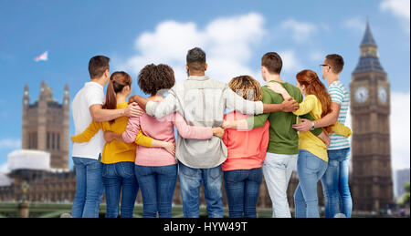 Rear view of diverse people hugging each other Stock Photo - Alamy