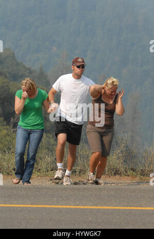 June 25, 2008 - Ron Presba's daughters react to the scene of his burned ...