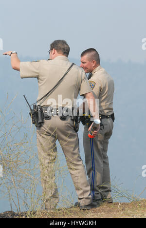June 25, 2008 - CHP officers investigate the scene where Ron Presba's ...