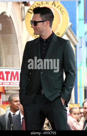 HOLLYWOOD, CA - FEBRUARY 10: (L-R) Actor Paul Mercurio and wife Andrea ...