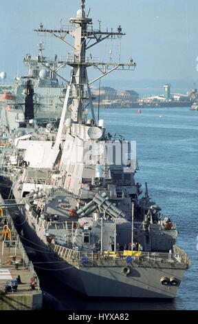 The guided-missile destroyer USS Ross docks at Naval Station Norfolk ...