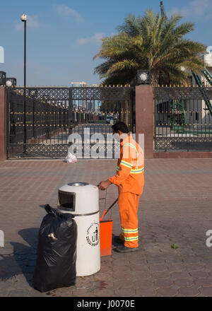 male cleaner in overall with cleaning supplies Stock Photo - Alamy
