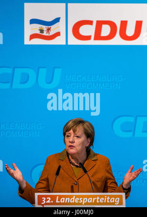 Grimmen, Germany. 08th Apr, 2017. German Chancellor Angela Merkel (C ...