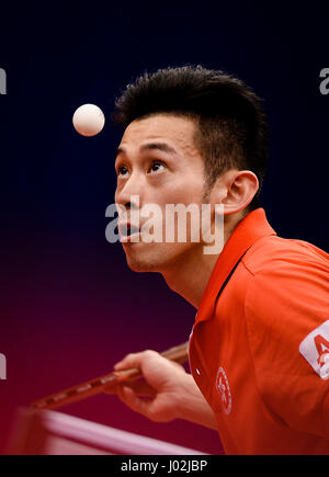 South Korea's Jang Woojin serves against Taiwan's Lin Yun-ju during ...