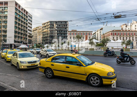 Yellow Greek taxi cab in Athens, Greece Stock Photo - Alamy