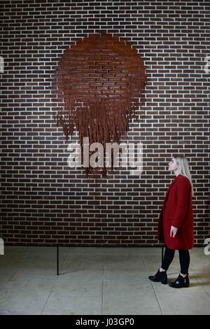 Yorkshire Sculpture Park's Millie Carroll is shown viewing work by ...