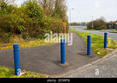 security bollards and grass earth berm protecting footpath in secure ...