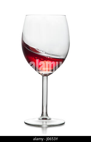 Moving red wine glass over a white background Stock Photo - Alamy