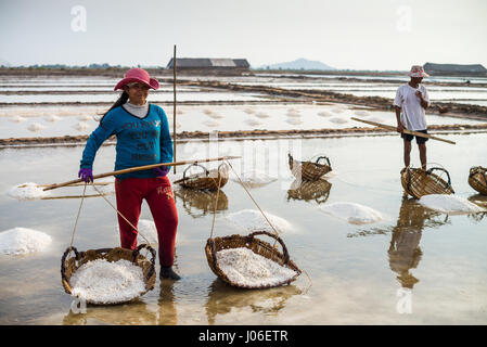 Local people working in the salt fields of Kampot, Cambodia, Asia Stock ...