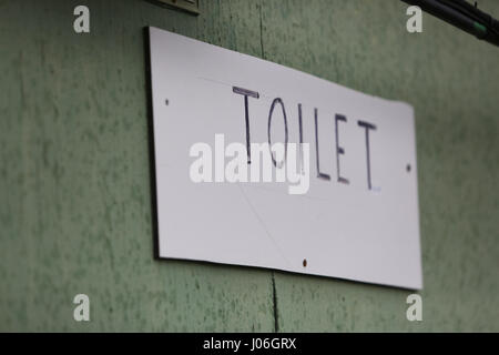 Old toilet sign pictured on the outside of a bathroom, UK Stock Photo ...