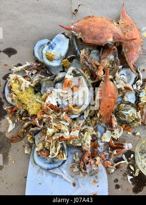 Leftover seafood shells after a feast of blue crab and oysters Stock ...