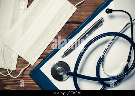 Desk of doctor with medicine things Stock Photo - Alamy