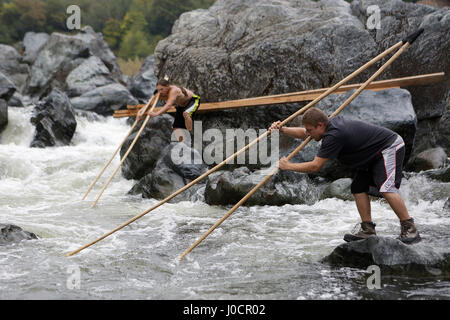 Jerry Brink (left) and J.J. Reed, of the Karuk Indian Tribe, use a dip ...