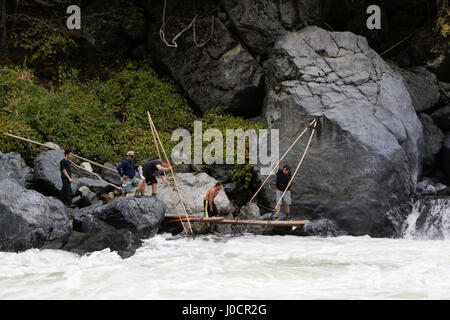 Fishermen from the Karuk Indian Tribe use dip nets to fish for salmon ...
