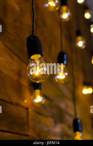 Decorative antique edison style filament light bulbs hanging Stock ...
