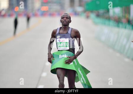Kenyan Stephen Sambu crossing the finish line to win the 2017 Shamrock ...
