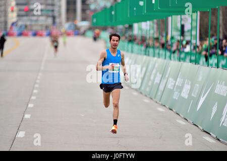 runners approaching the finish line of a race Stock Photo - Alamy