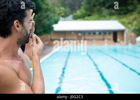 Lifeguard blowing whistle at Swimming pool with transition 3d Stock ...